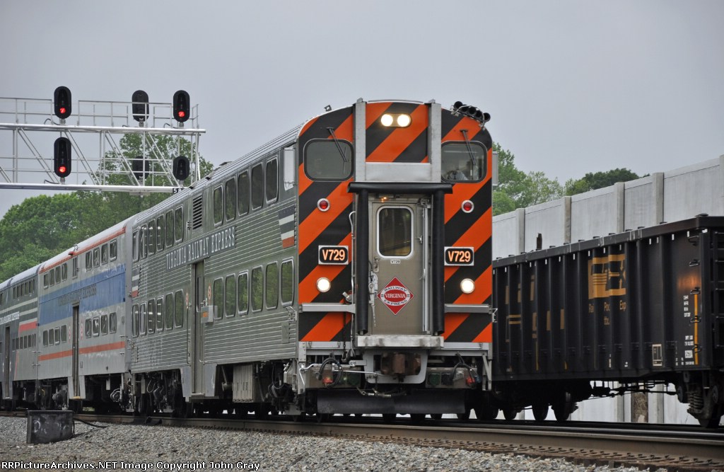 VRE Cab Car V729 leads this rainbow of paint schemed coaches